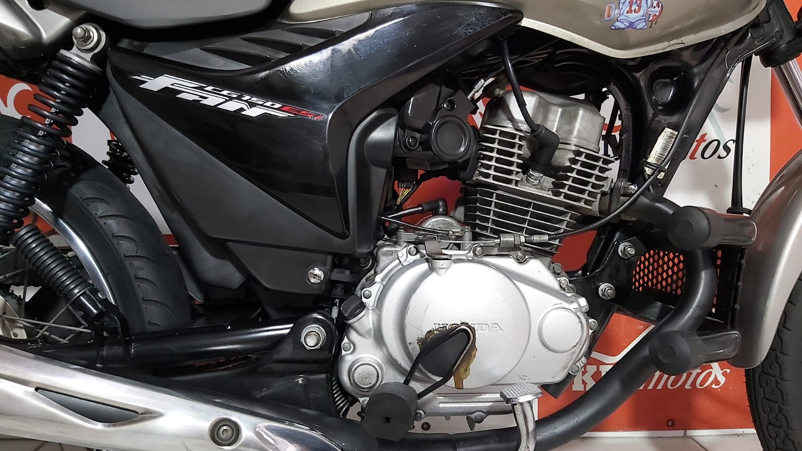 Honda CG 150 Fan 2010 Cinza | KM Motos | Sua Loja de Motos Seminovas